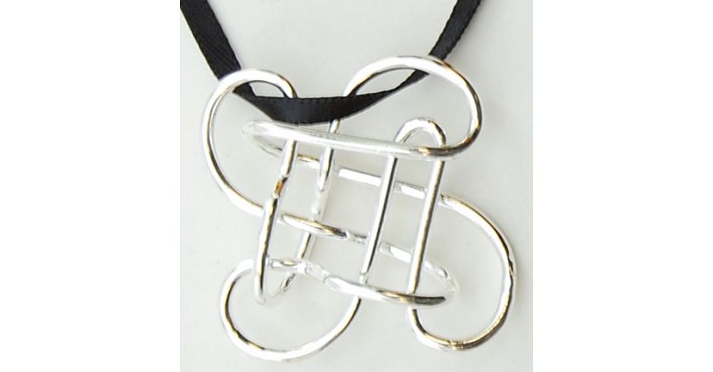 Puzzle Solution for Puzzle Pendant - Mystery Clover - Puzzle Master Inc.